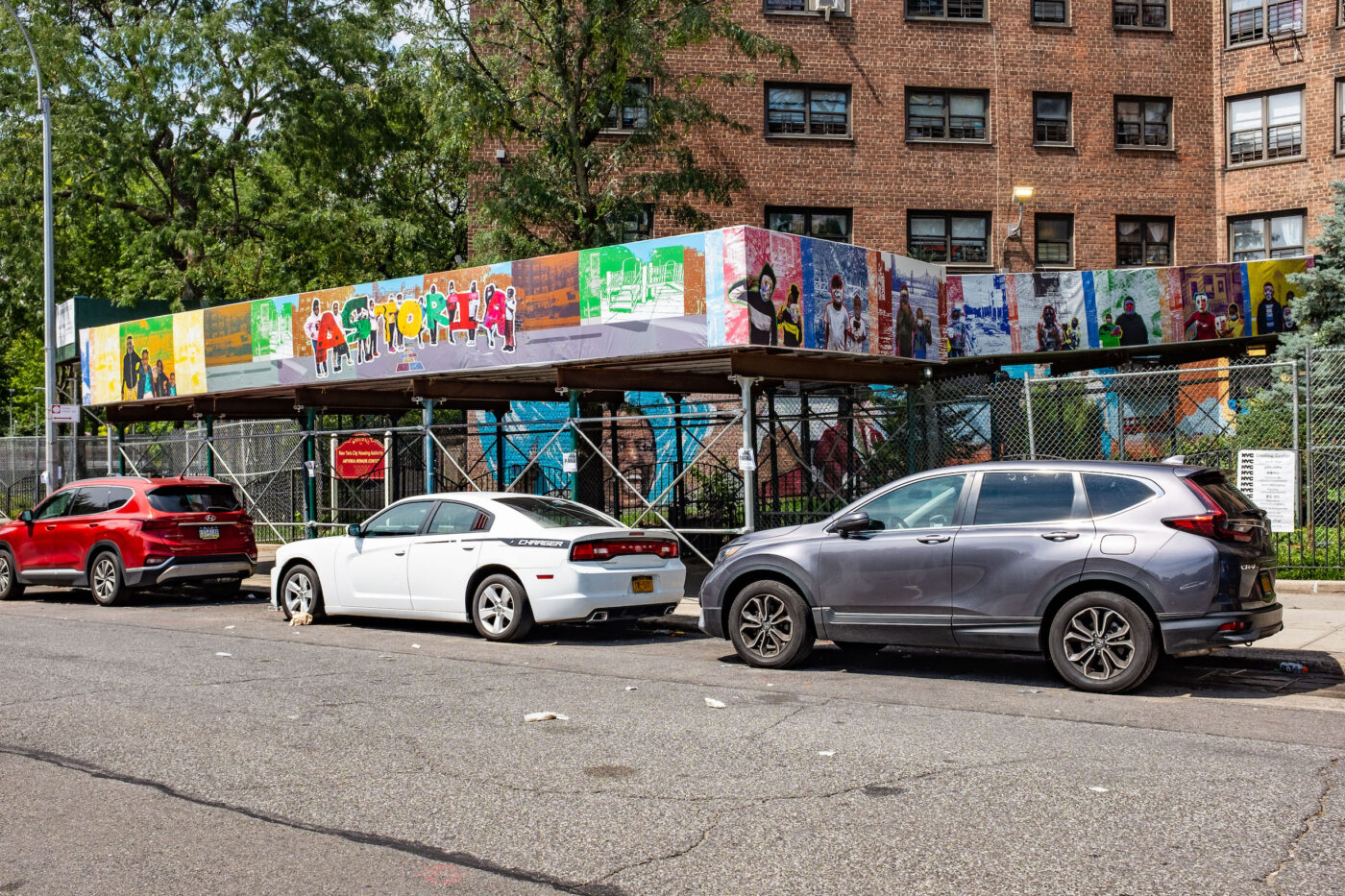 Artists Use NYCHA Scaffolding as Canvas - Queens Ledger