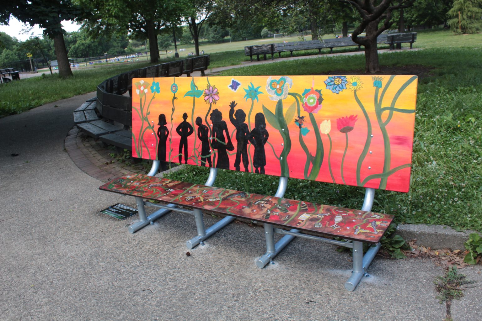 Queens Students Illuminate Social Issues with Vibrant Bench Murals at ...